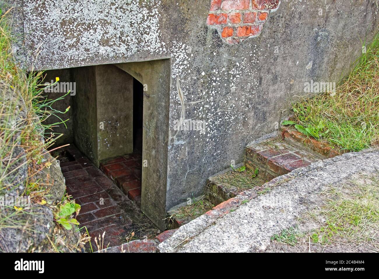 entrance to German bunker, stucco, brick, 3 steps, stark, Atlantic Wall ...