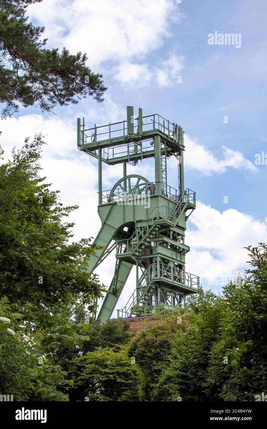 mining tower of an old mine surrounded by trees, outdoors Stock Photo ...