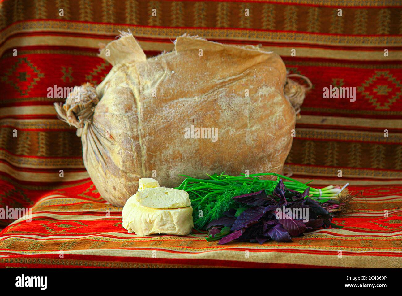 White cheese and herbs on a ethnic tablecloth Stock Photo - Alamy