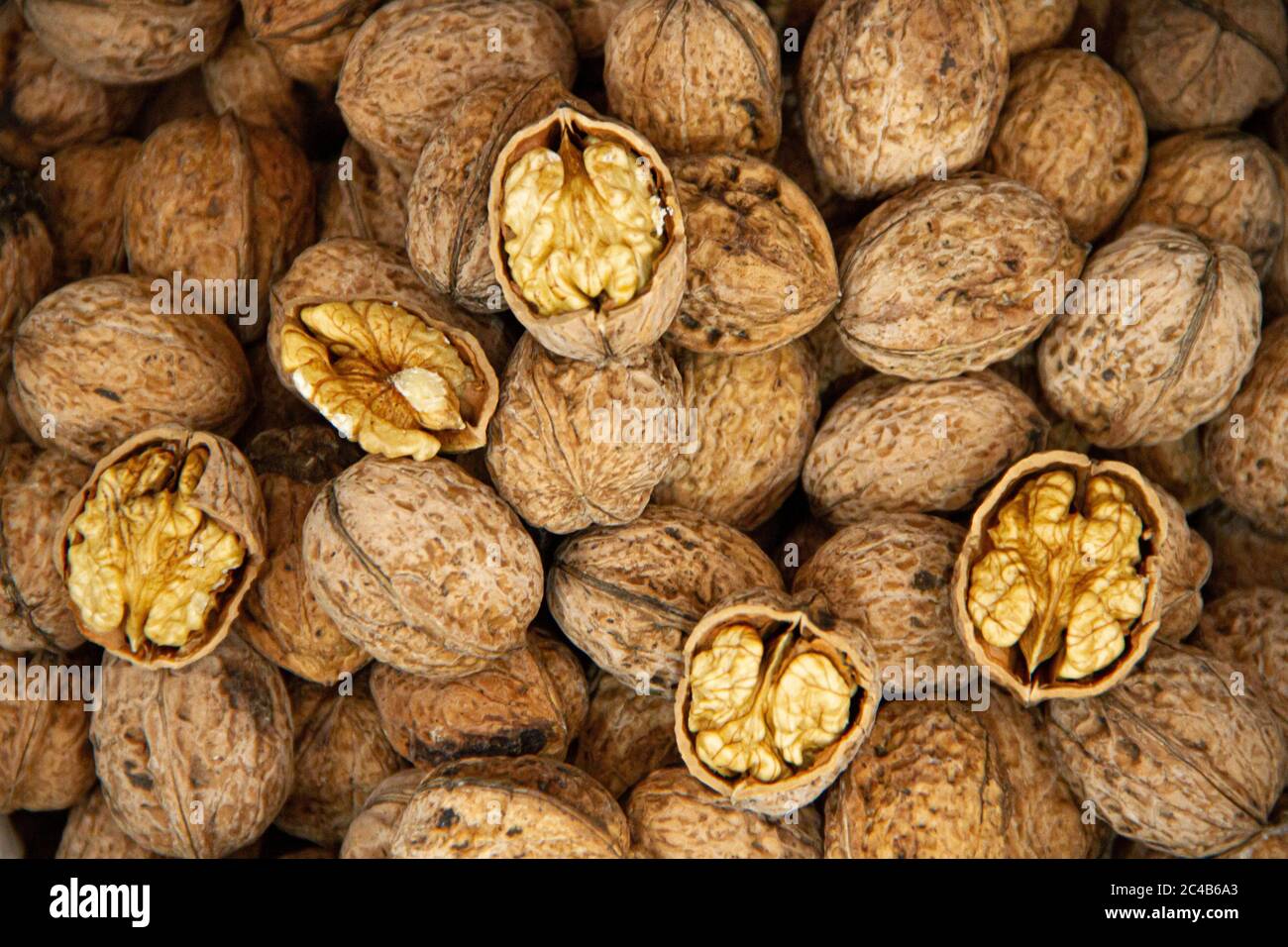 Walnuts in their shells hi-res stock photography and images - Alamy