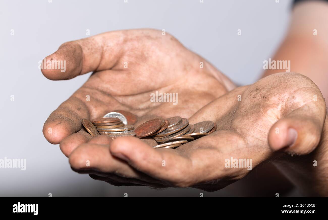 Hand holding pennies hi-res stock photography and images - Alamy