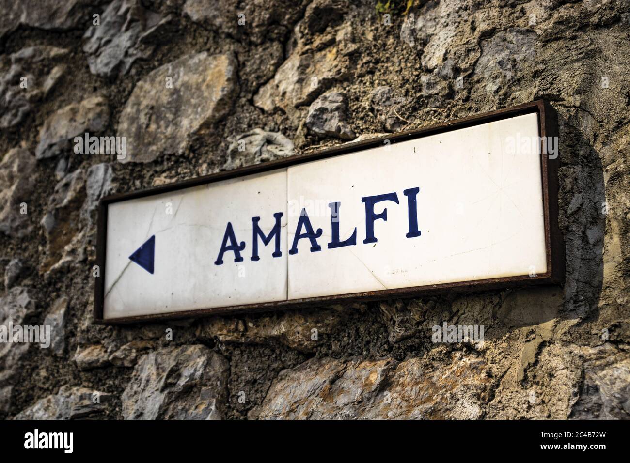 close-up of an ancient road sign of Ravello, indicating the direction ...