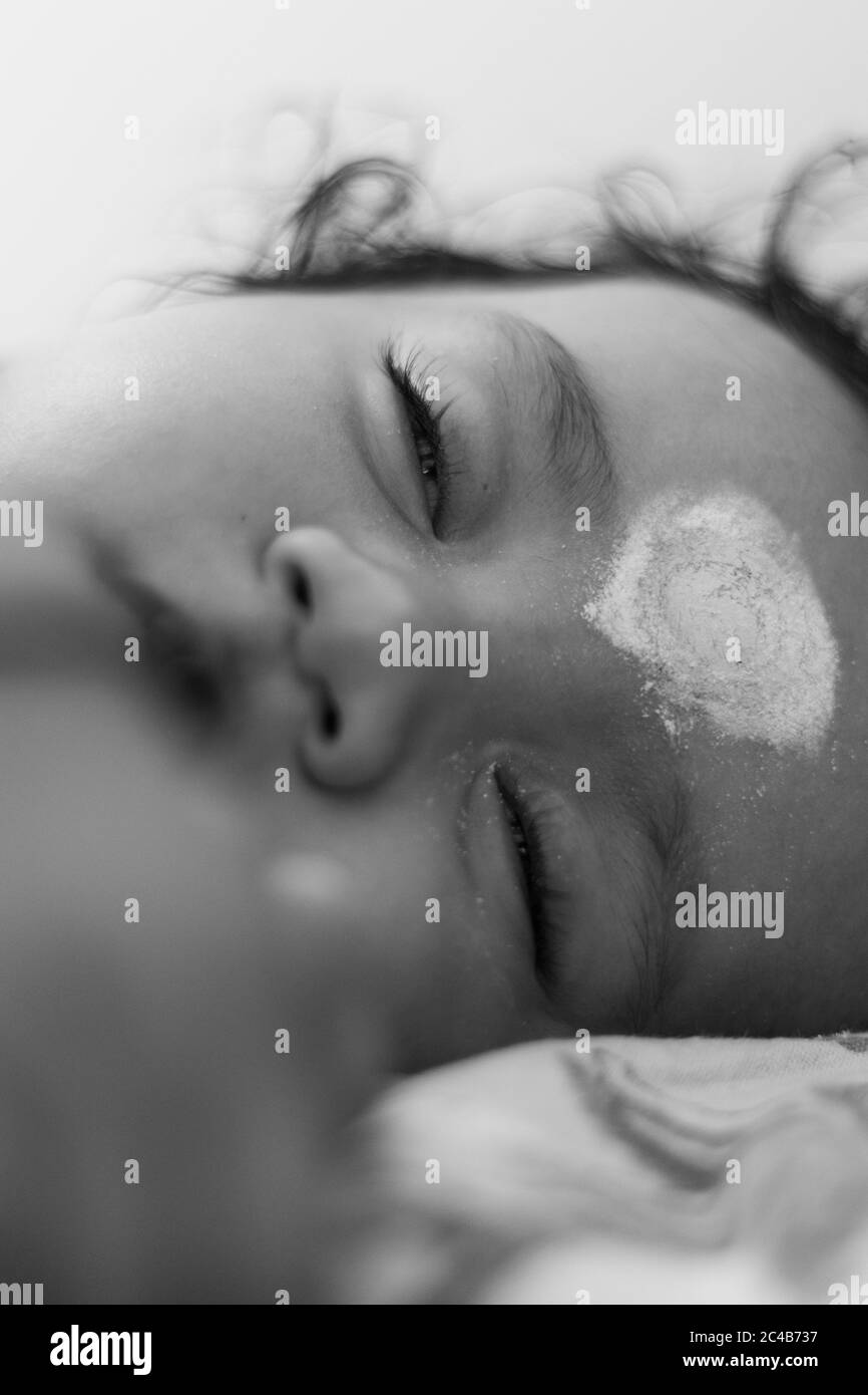 Infant baby body parts in black and white composition Stock Photo - Alamy