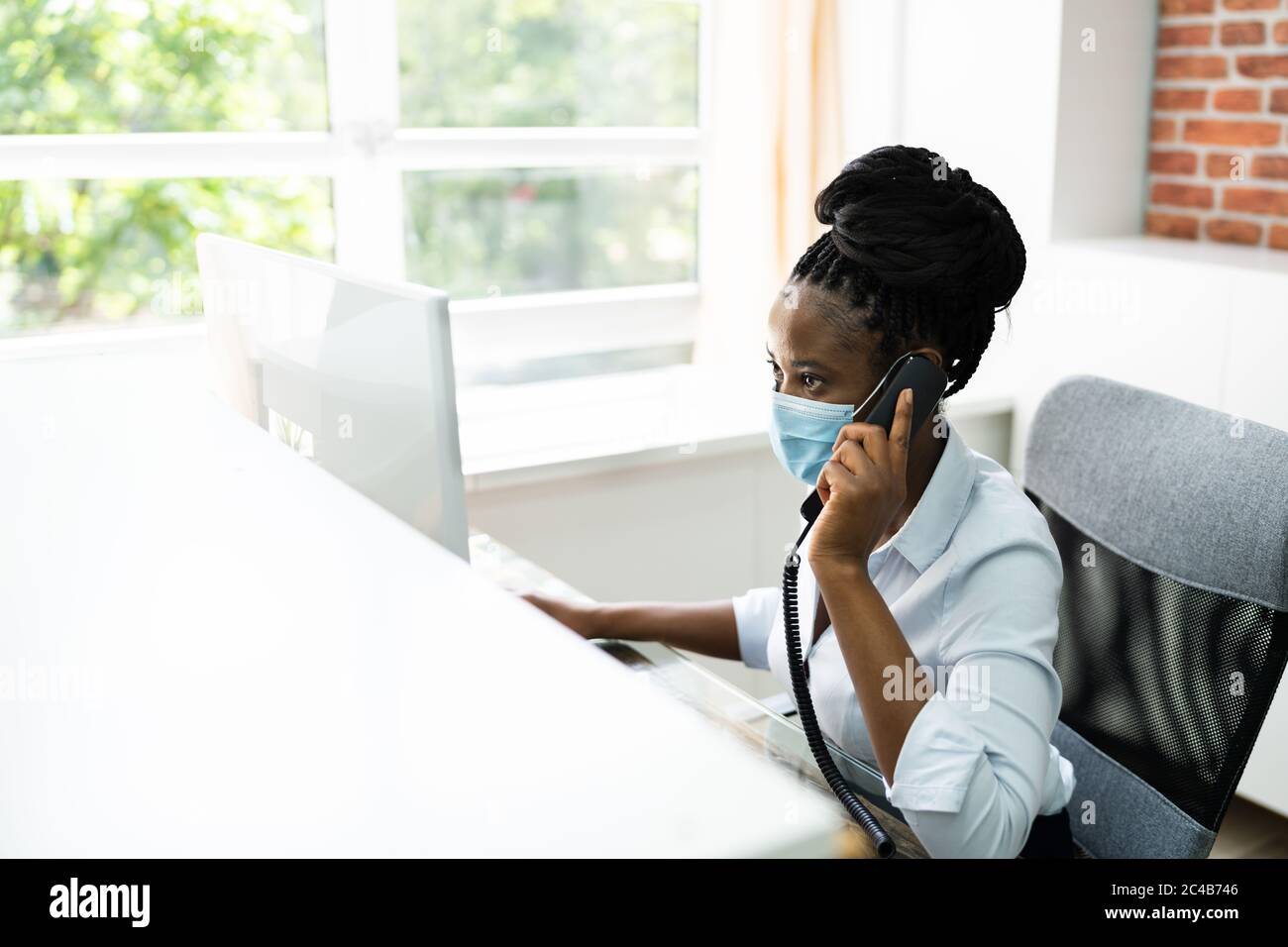 Medical receptionist hi-res stock photography and images - Alamy