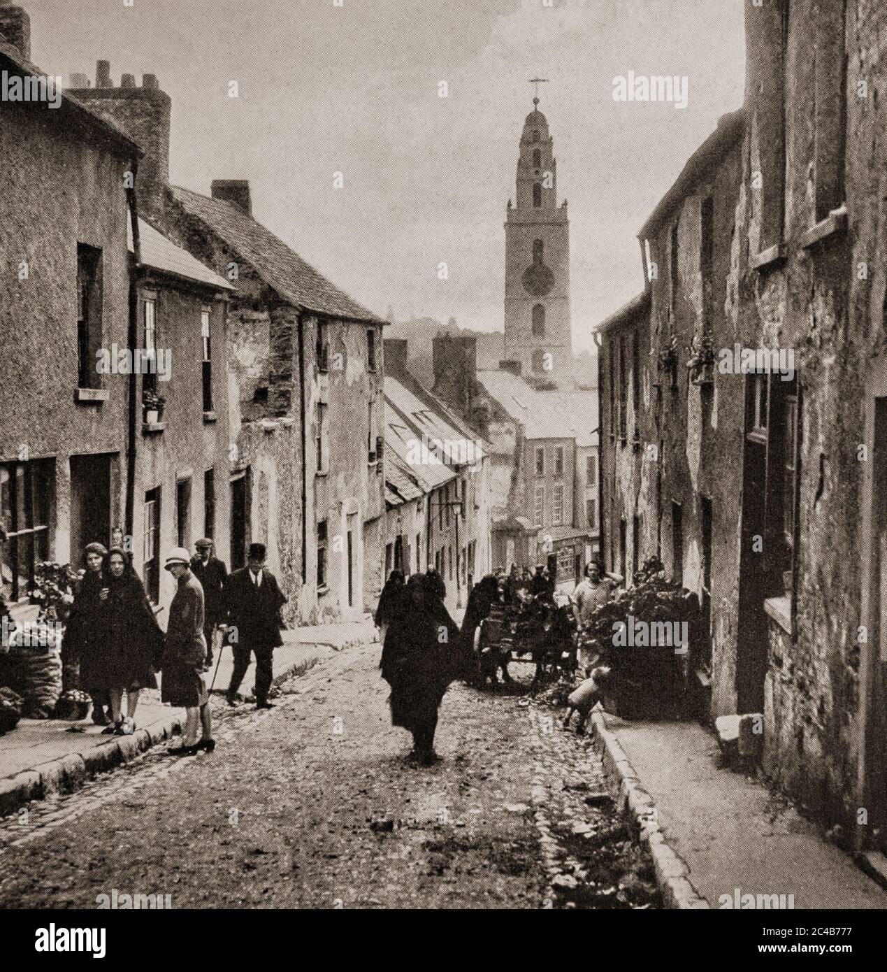An early 1920's street scene in Shandon, Cork City. The tower of St Ann ...