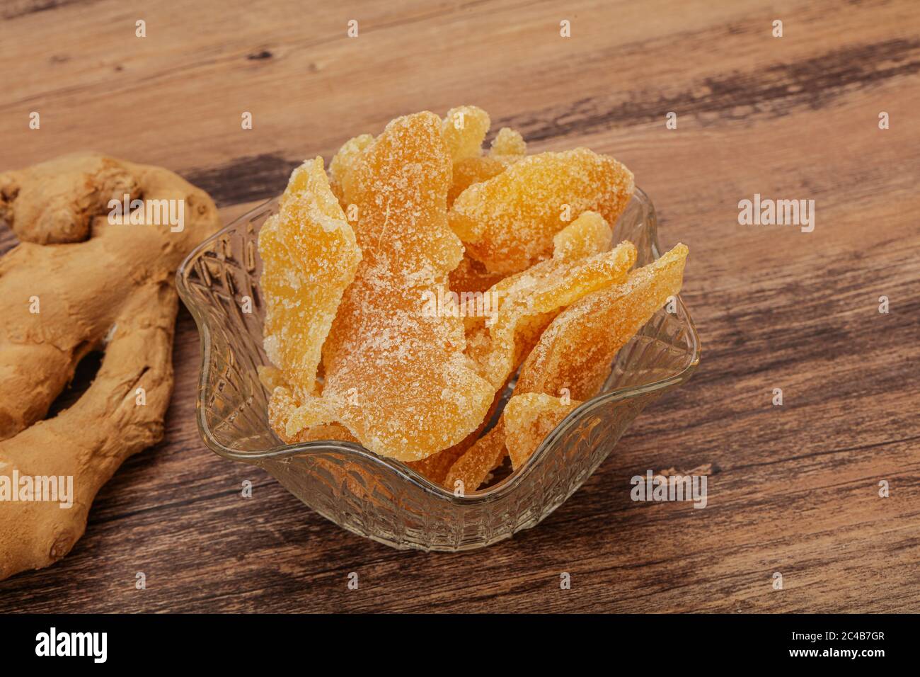 Dry sweet ginger snack in the bowl Stock Photo - Alamy
