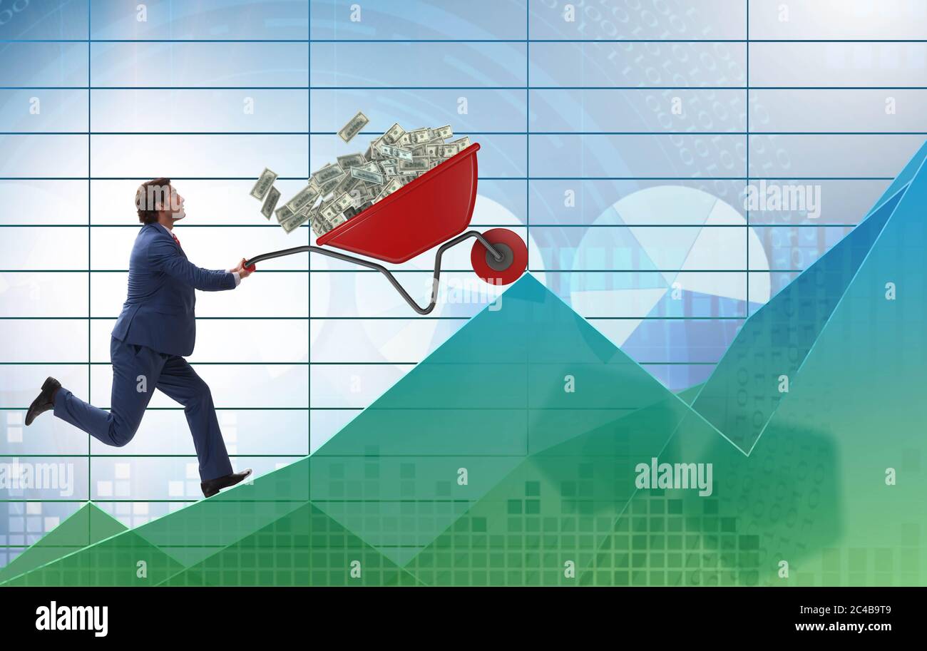 The businessman pushing wheelbarrow full of dollar money Stock Photo ...