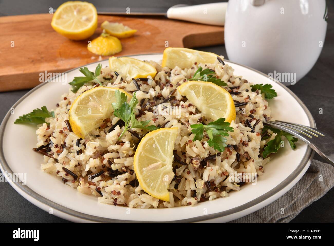 A plate of blended wild rice, quinoa and brown rice with lemon and ...
