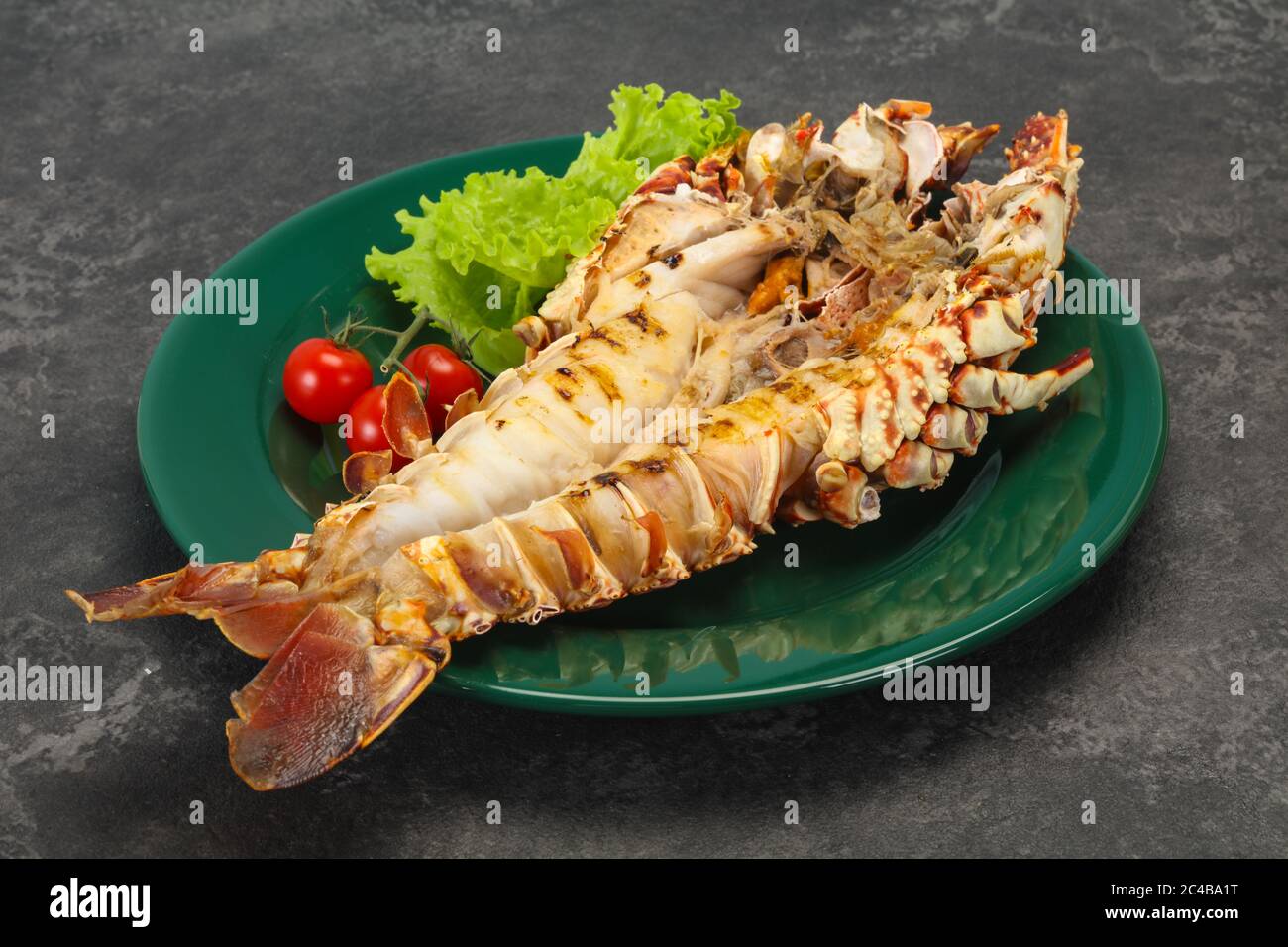 Grilled crayfish in the plate served salad Stock Photo - Alamy