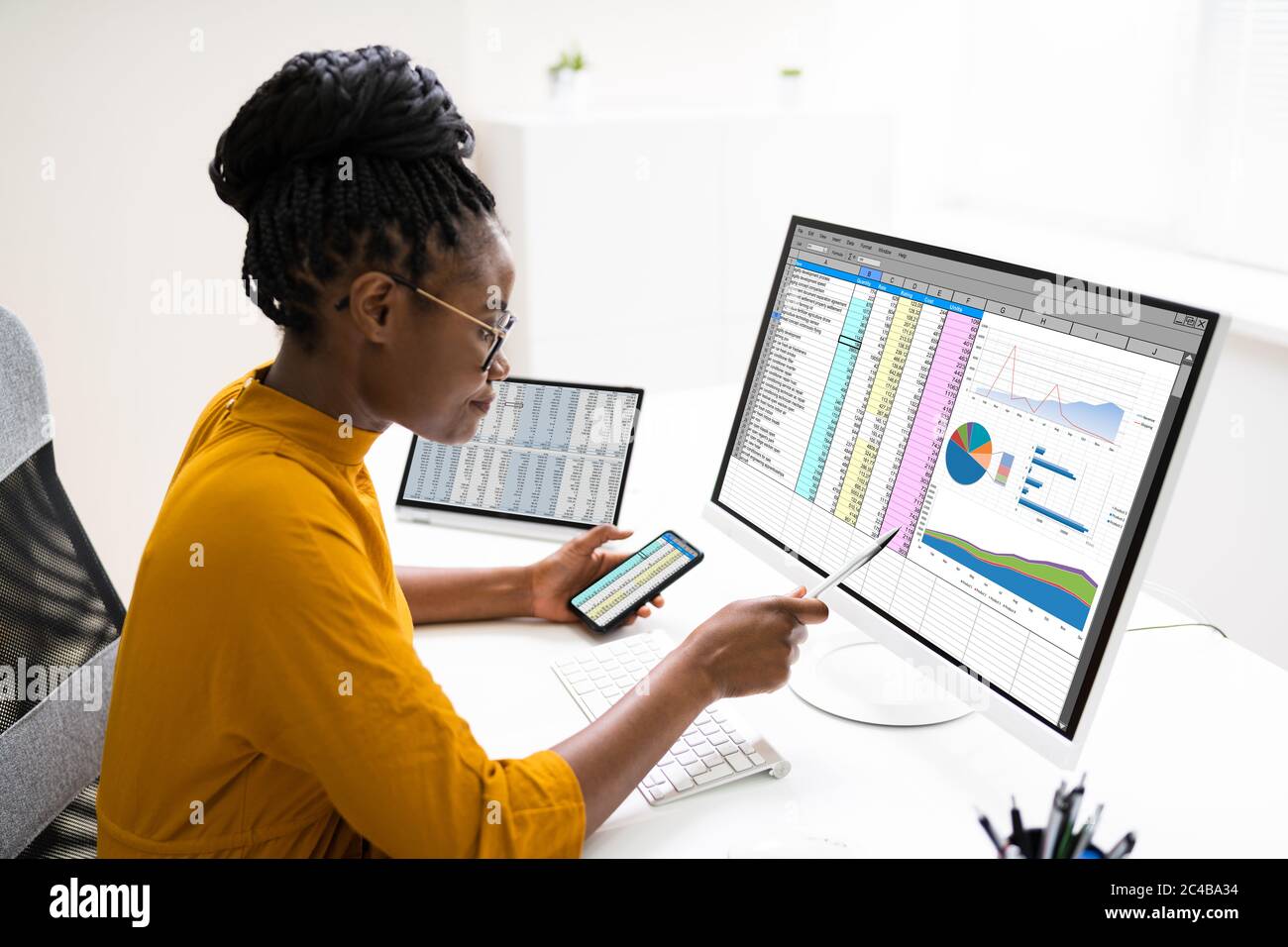African American Business Data Analyst Woman Using Computer Stock Photo ...