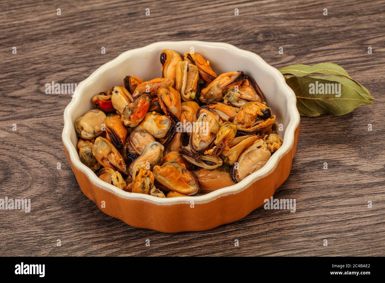 Pickled mussels with spices in the bowl Stock Photo - Alamy