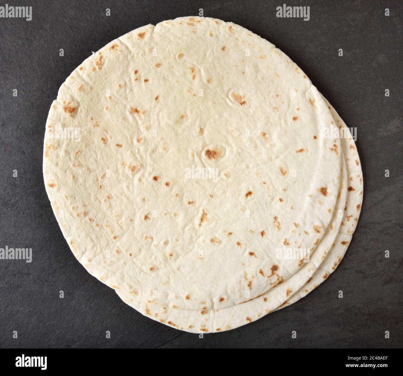 A stack of flour tortillas on a countertop Stock Photo - Alamy