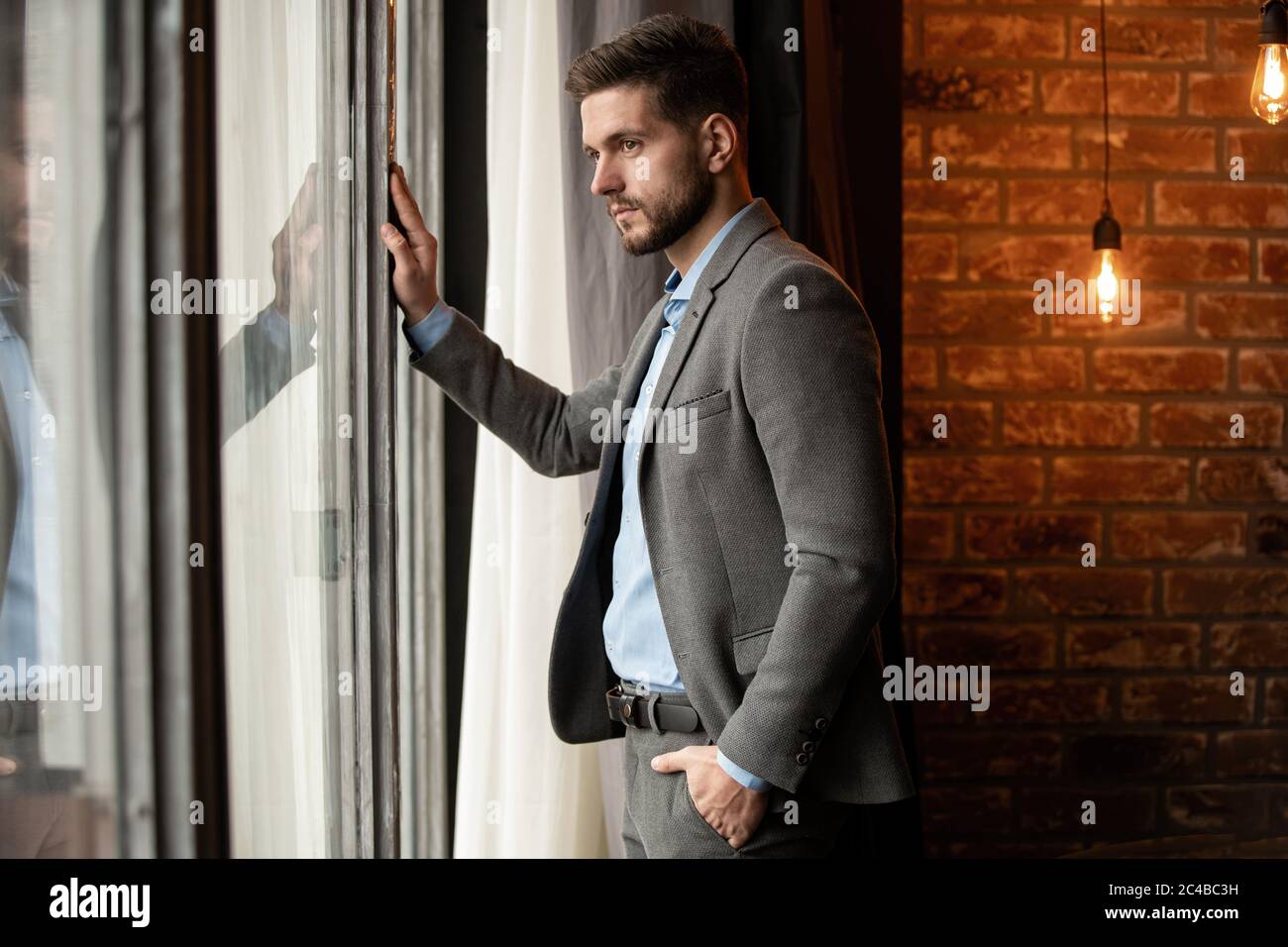 Concerned businessman in modern office hi-res stock photography and ...