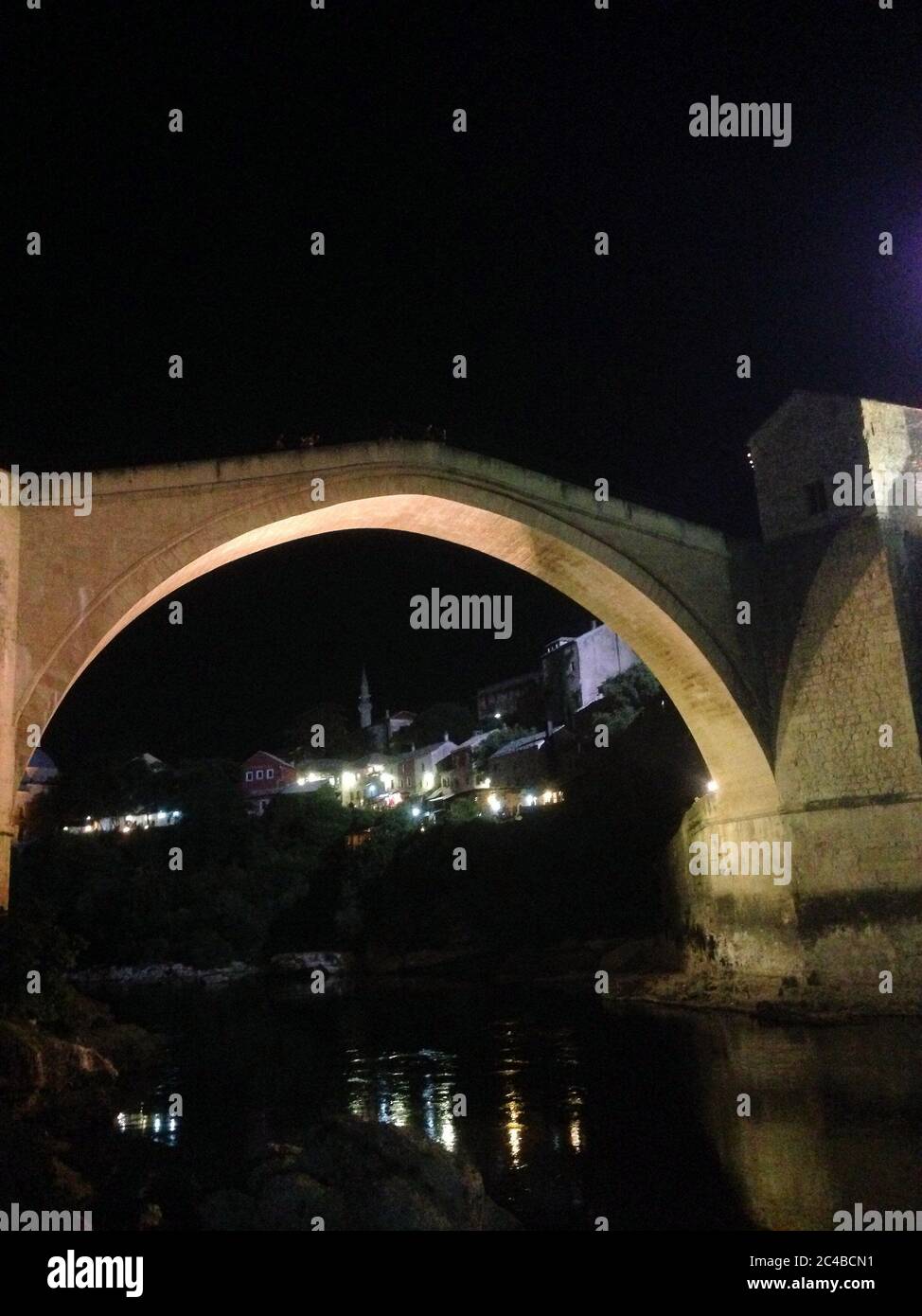 Famous old stone bridge in Mostar at night Stock Photo - Alamy