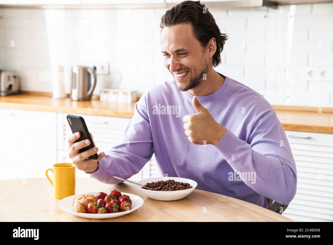 Thumbs up young creative man hi-res stock photography and images - Alamy