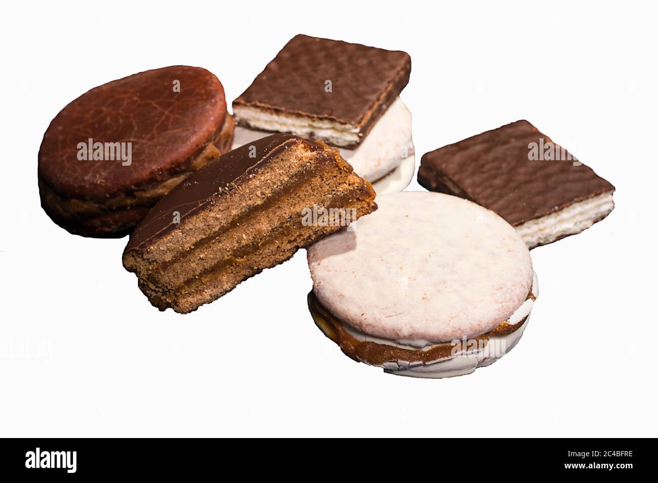 Some Argentinian traditional snacks with chocolate on a white ...