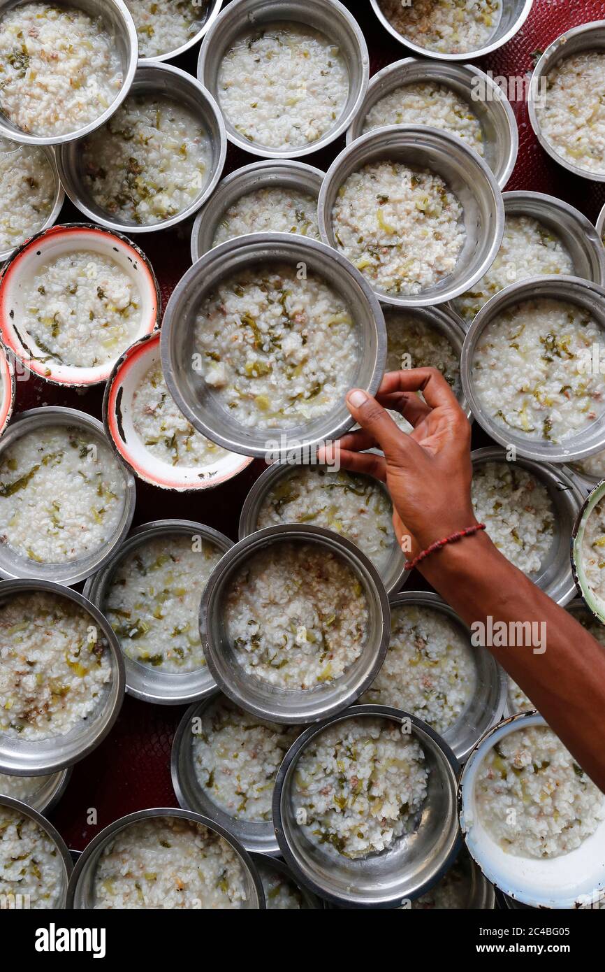Free food distribution for street children Stock Photo - Alamy