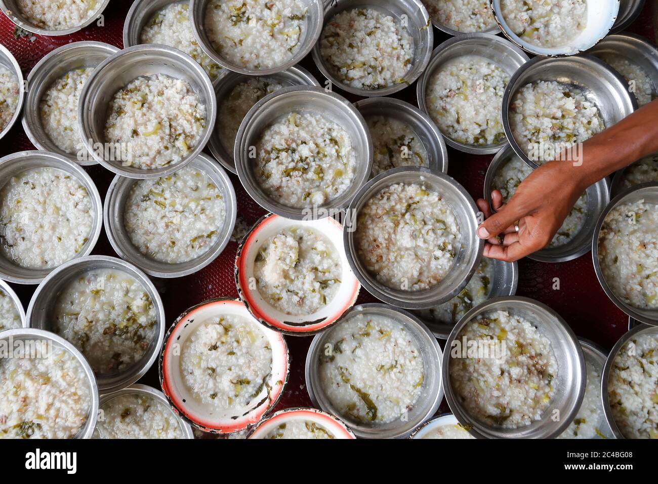 Free food distribution for street children Stock Photo - Alamy
