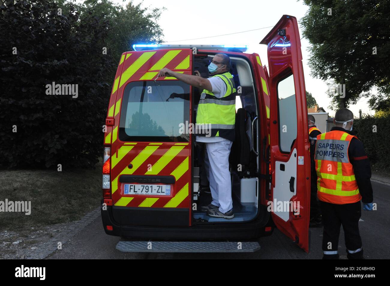 Doctor fireman hi-res stock photography and images - Alamy