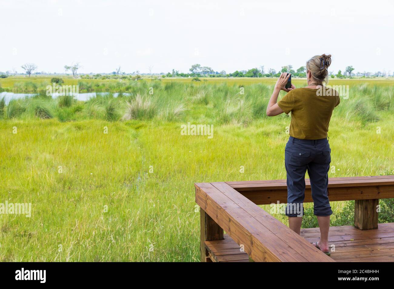 Woman photographing the landscape hi-res stock photography and images ...