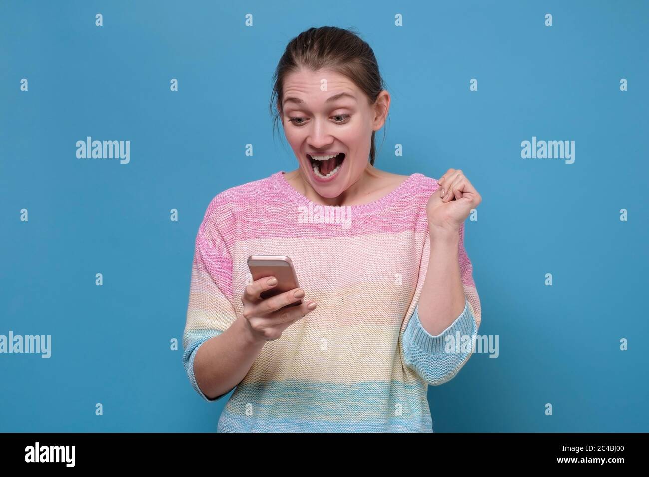 Image of a happy optimistic young pretty woman posing isolated over ...