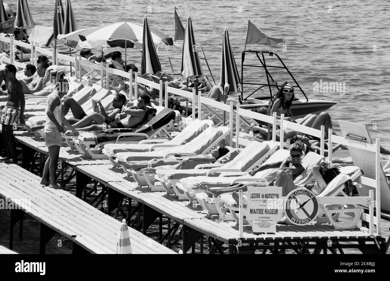 CANNES CROISETTE FRENCH RIVIERA - BEACH PIER IN SUMMER TIME - BLACK AND ...