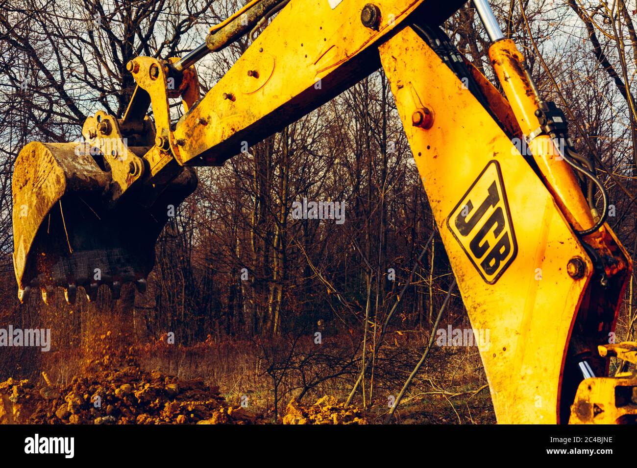Trostyanets, Ukraine December 20, 2019: excavator digging soil in ...
