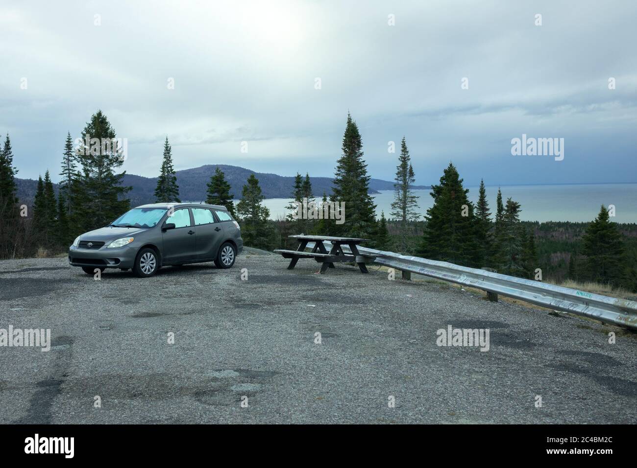 Car Camping Sleeping In Their Car At A Scenic Lookout Layby Picnic Area ...