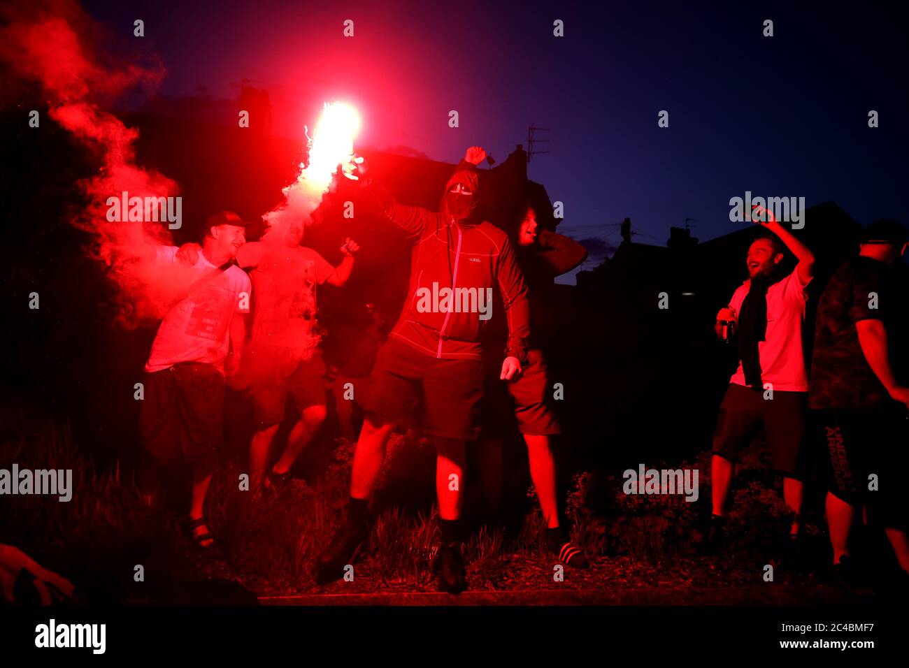 Liverpool fans let off flares outside Anfield, Liverpool Stock Photo ...