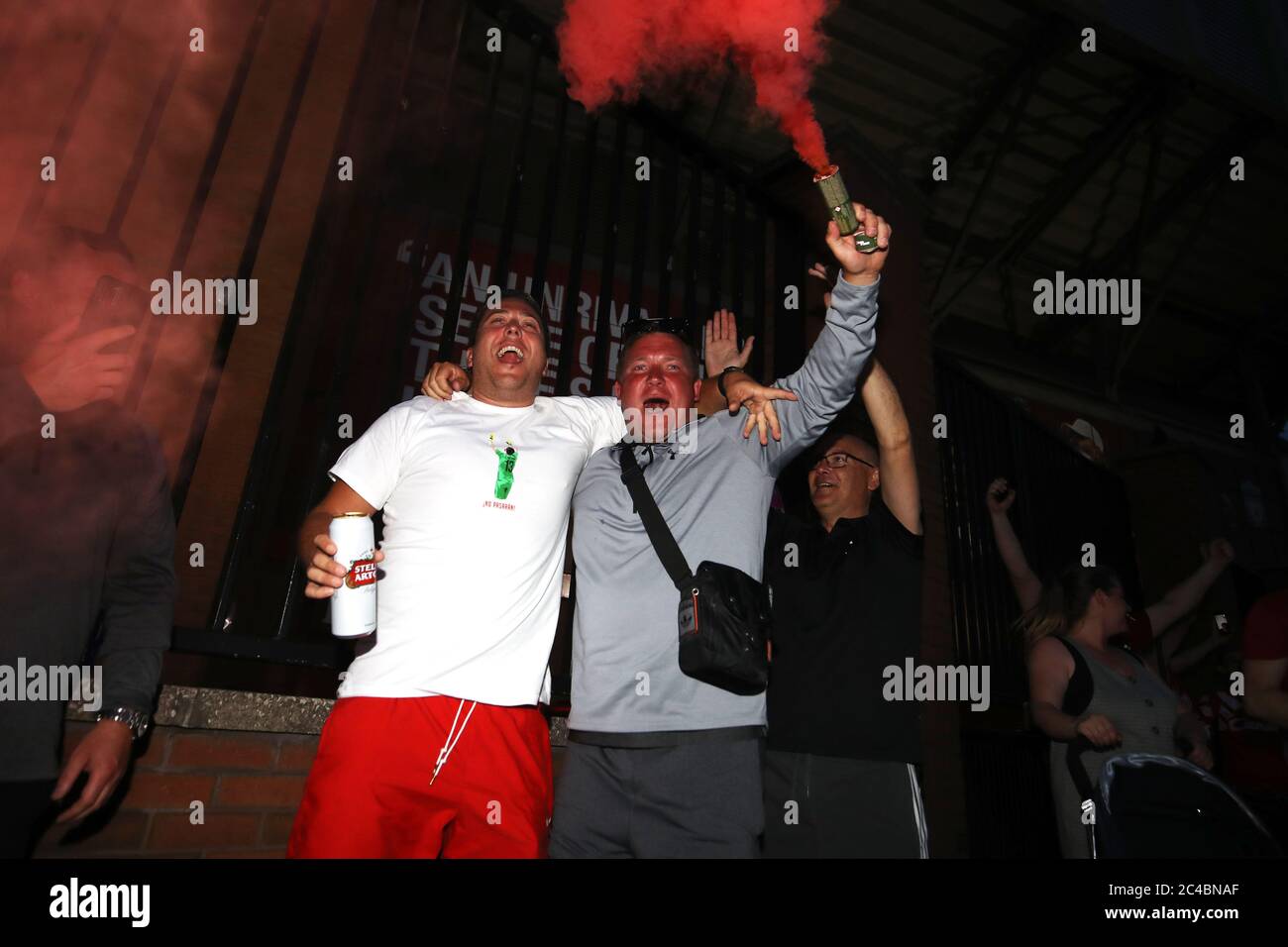 Liverpool fans let off flares outside Anfield, Liverpool Stock Photo ...