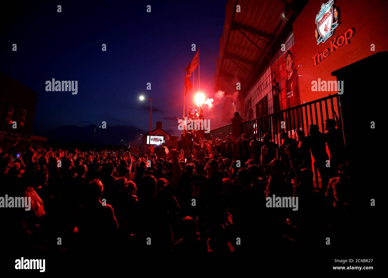 Liverpool fans celebrate outside Anfield, Liverpool Stock Photo - Alamy