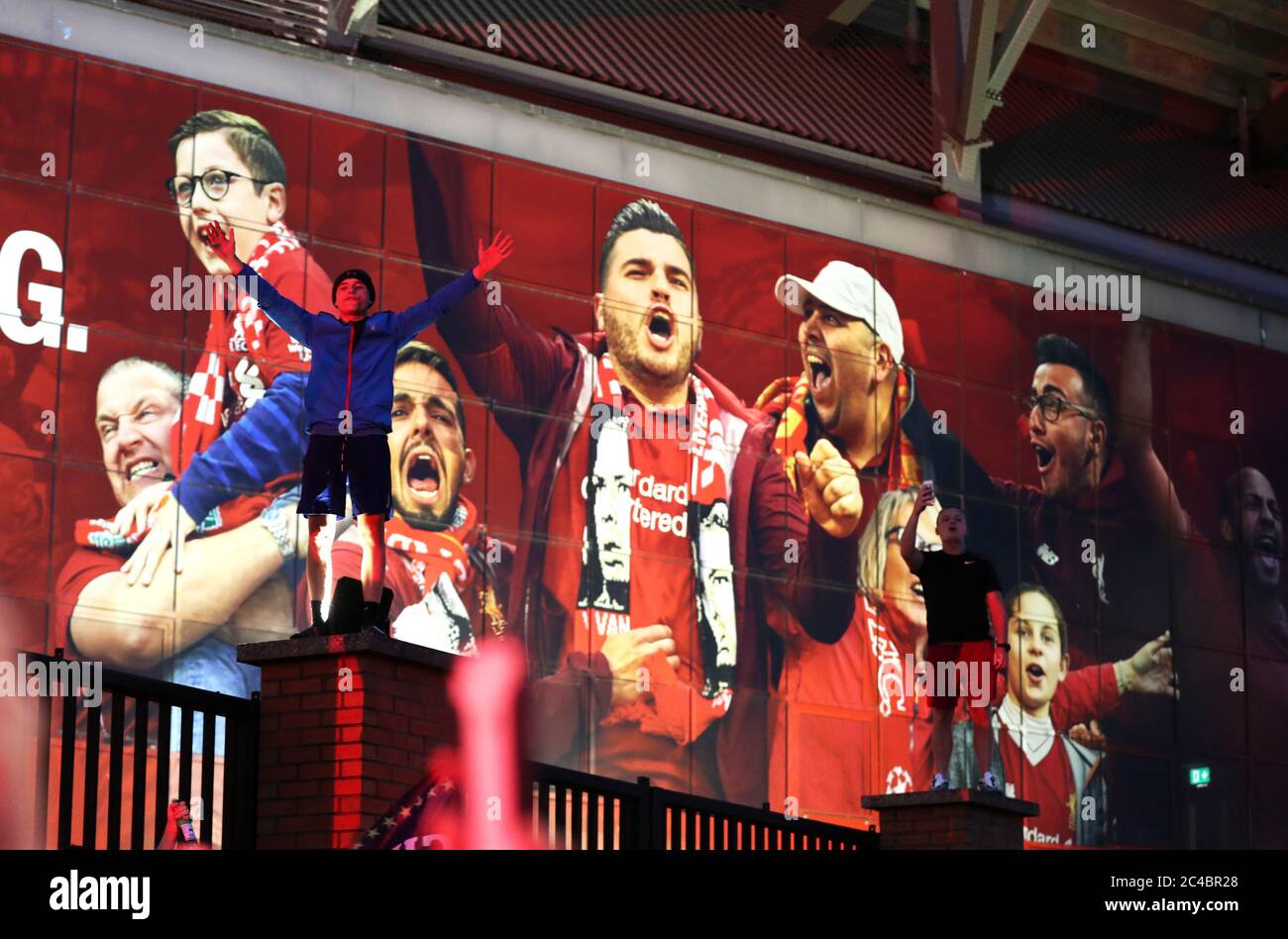 Liverpool fans celebrate outside Anfield, Liverpool Stock Photo - Alamy