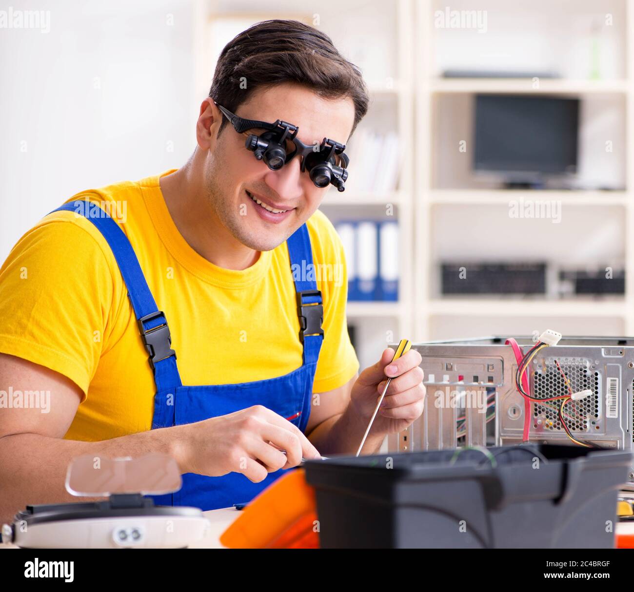 The computer repair technician repairing hardware Stock Photo - Alamy