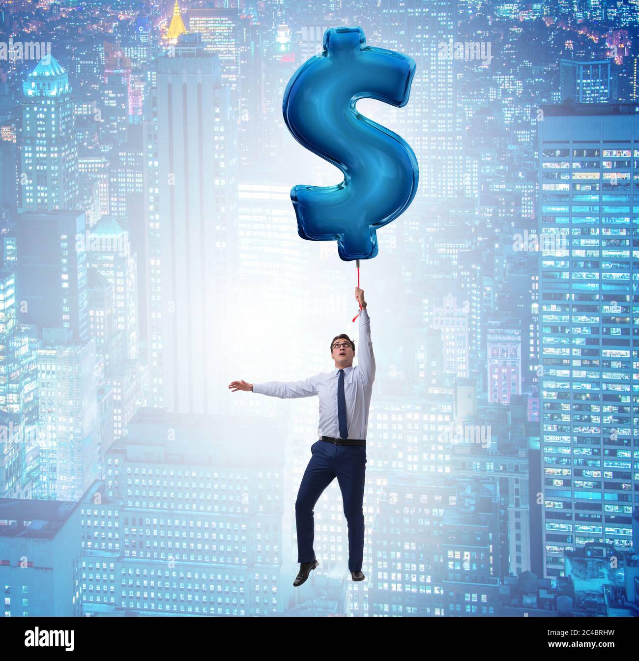 The businessman flying on dollar sign inflatable balloon Stock Photo ...