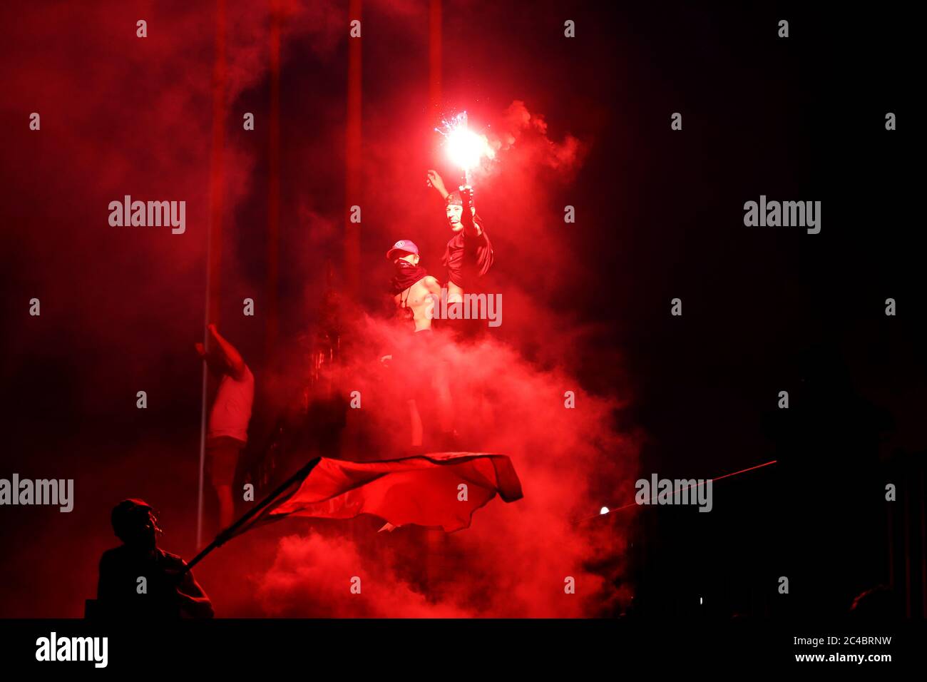 Liverpool fans let off flares outside Anfield, Liverpool Stock Photo ...