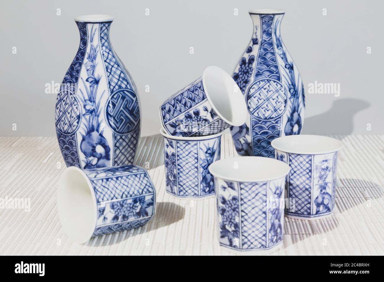 Blue and white patterned Japanese sake set Stock Photo - Alamy
