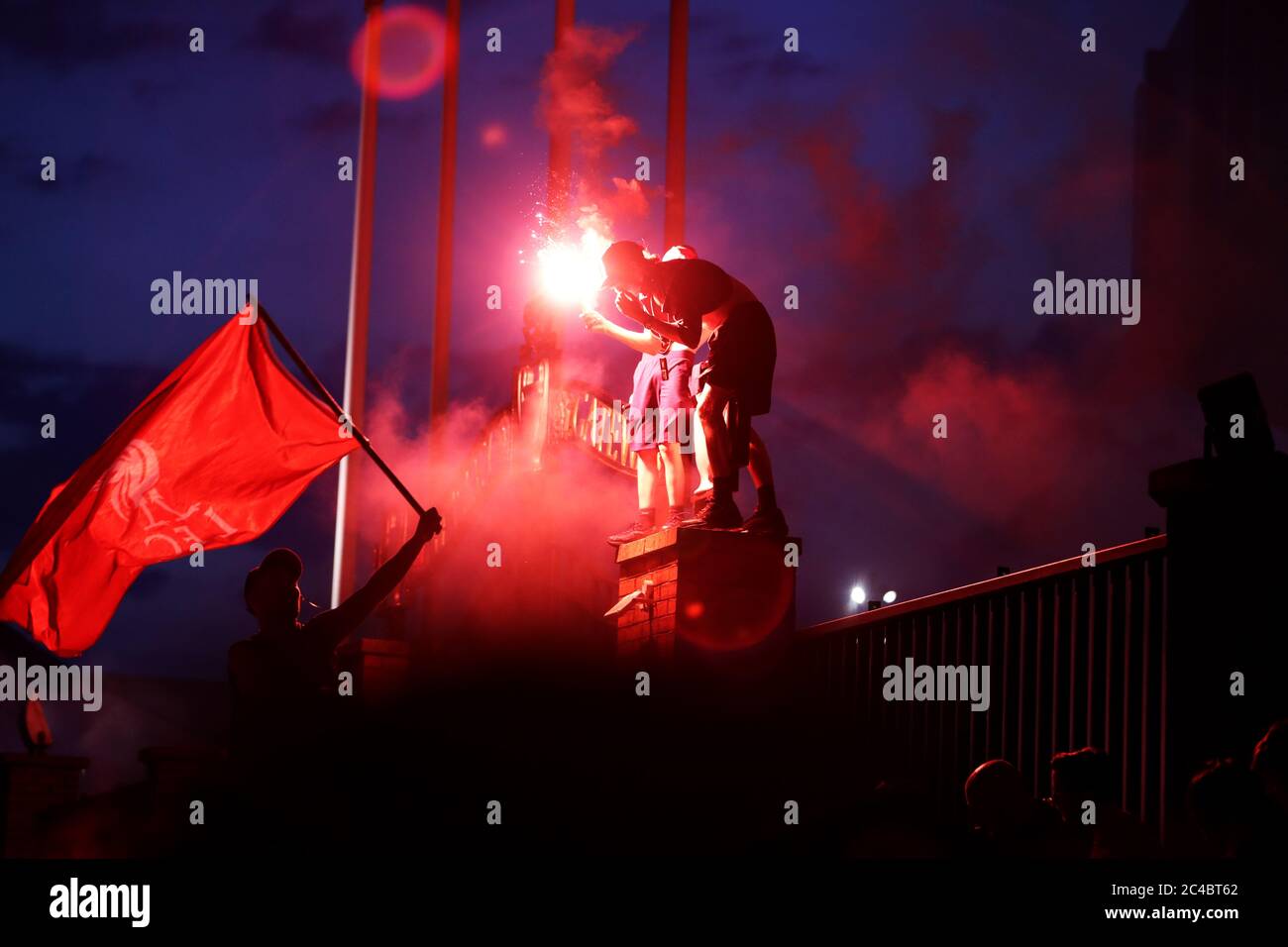 Liverpool fans let off flares outside Anfield, Liverpool Stock Photo ...