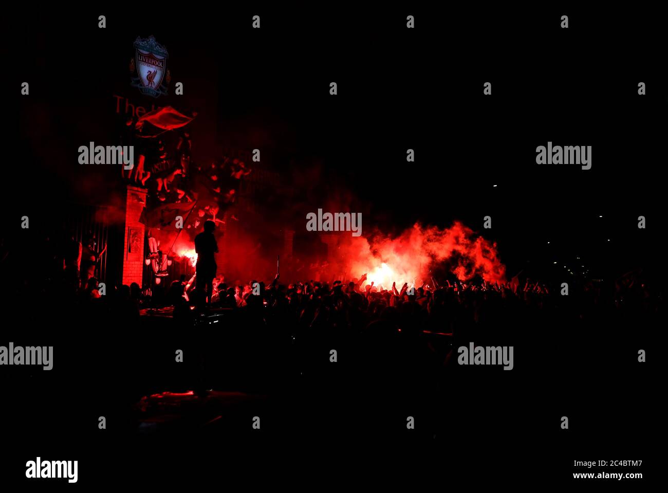 Liverpool fans let off flares outside Anfield, Liverpool Stock Photo ...