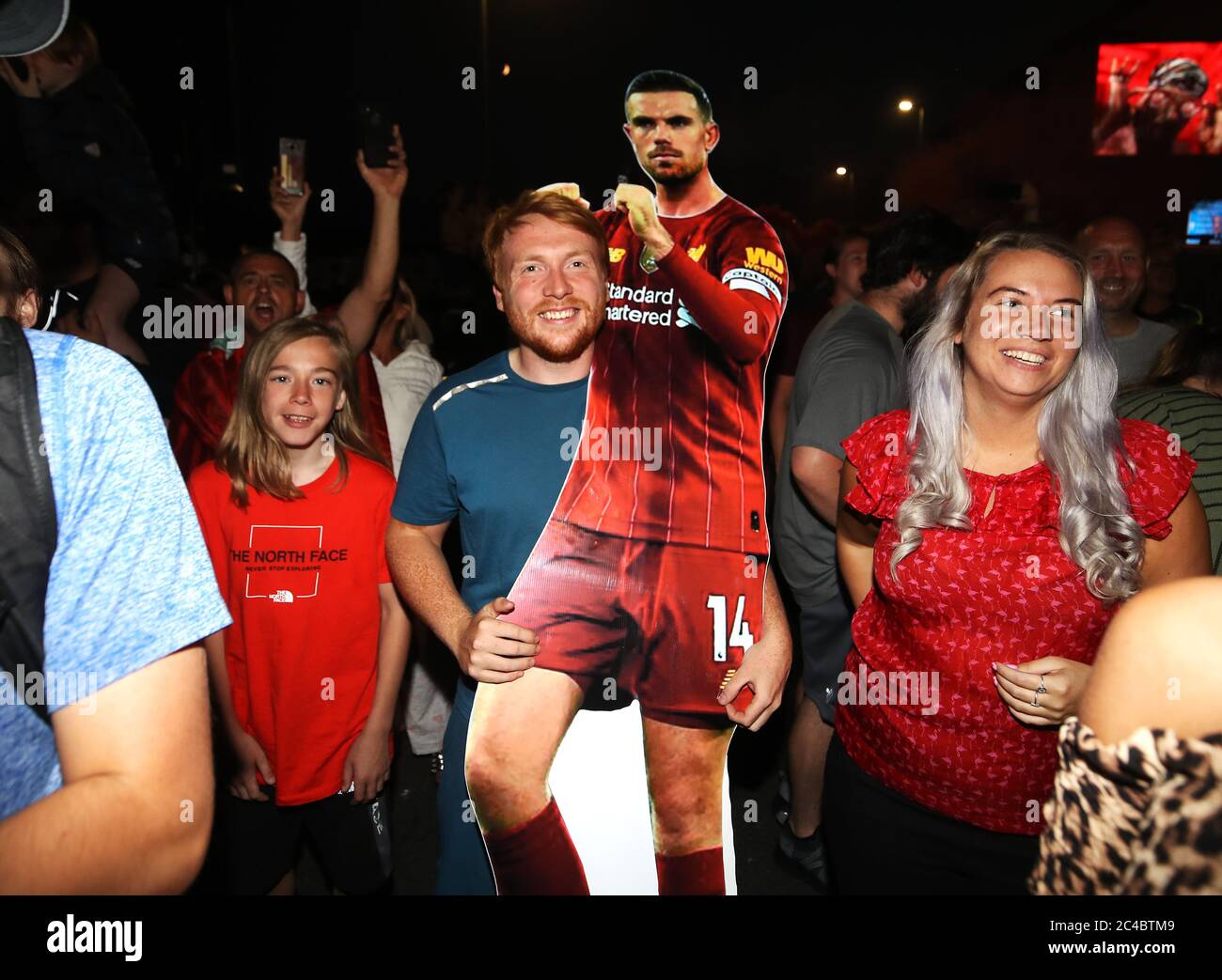 Liverpool fans celebrate outside Anfield, Liverpool Stock Photo - Alamy