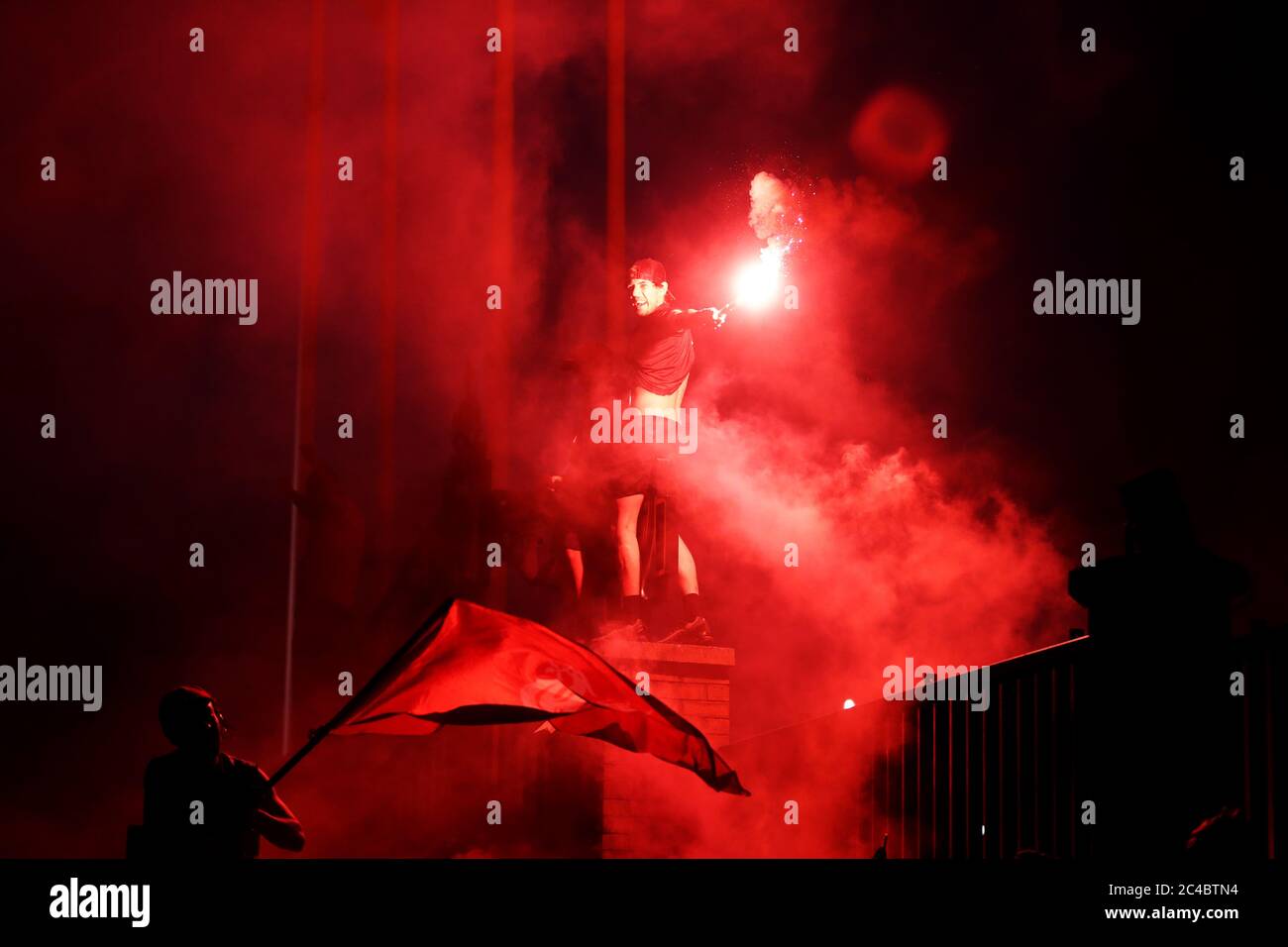 Liverpool fans let off flares outside Anfield, Liverpool Stock Photo ...