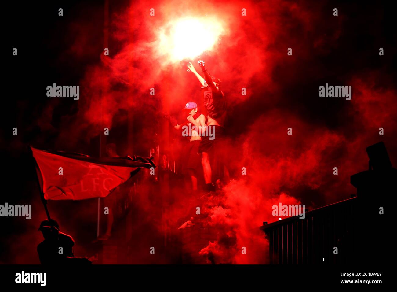 Liverpool fans let off flares outside Anfield, Liverpool Stock Photo ...