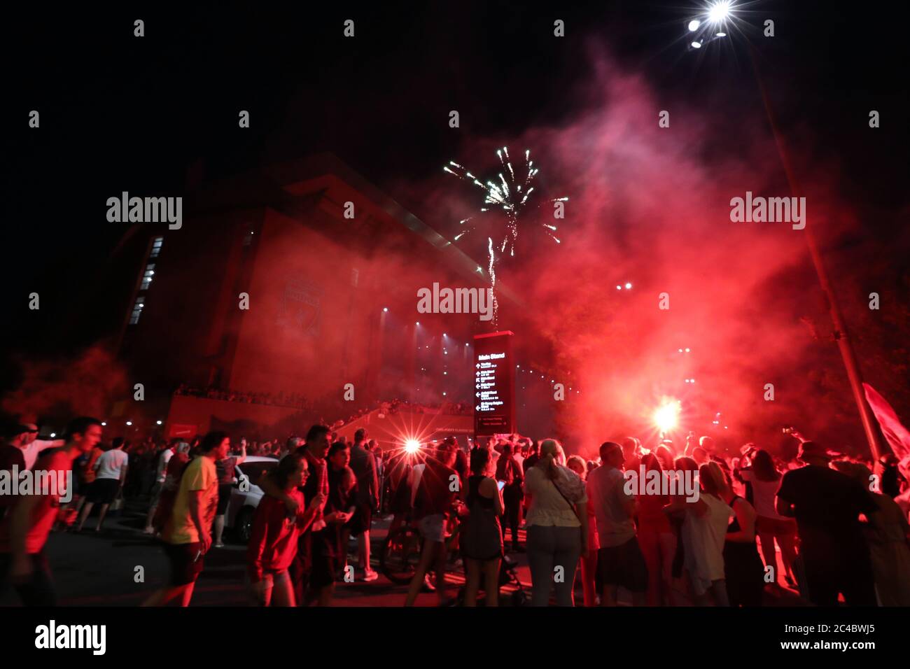 Liverpool fans celebrate outside Anfield, Liverpool Stock Photo - Alamy