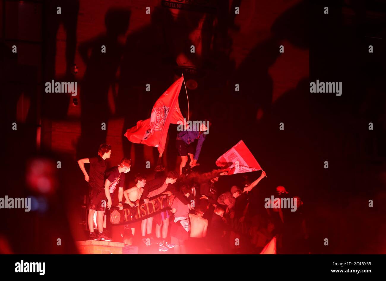 Liverpool fans celebrate outside Anfield, Liverpool Stock Photo - Alamy