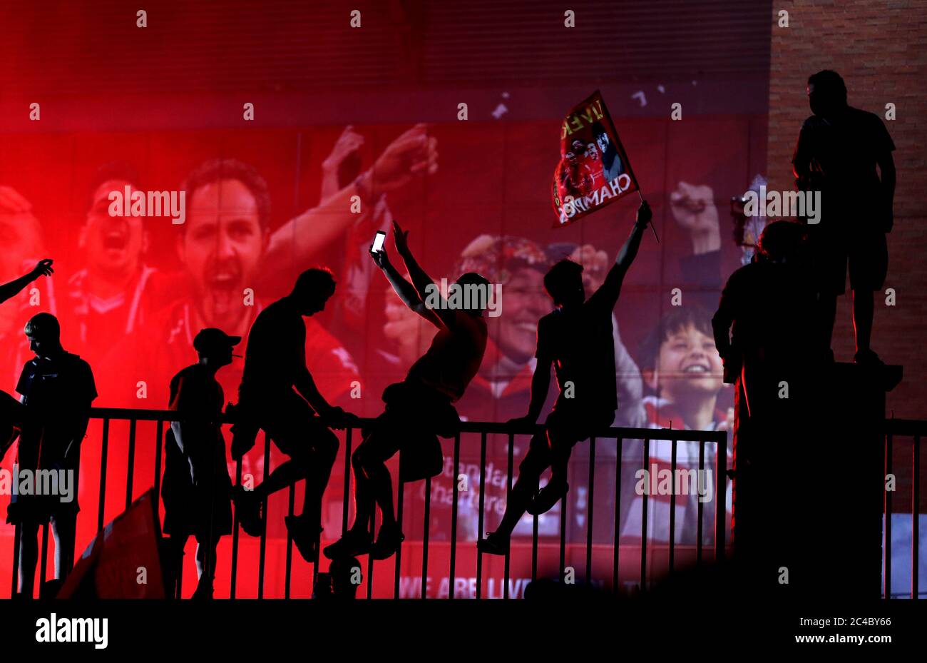 Liverpool fans celebrate outside Anfield, Liverpool Stock Photo - Alamy