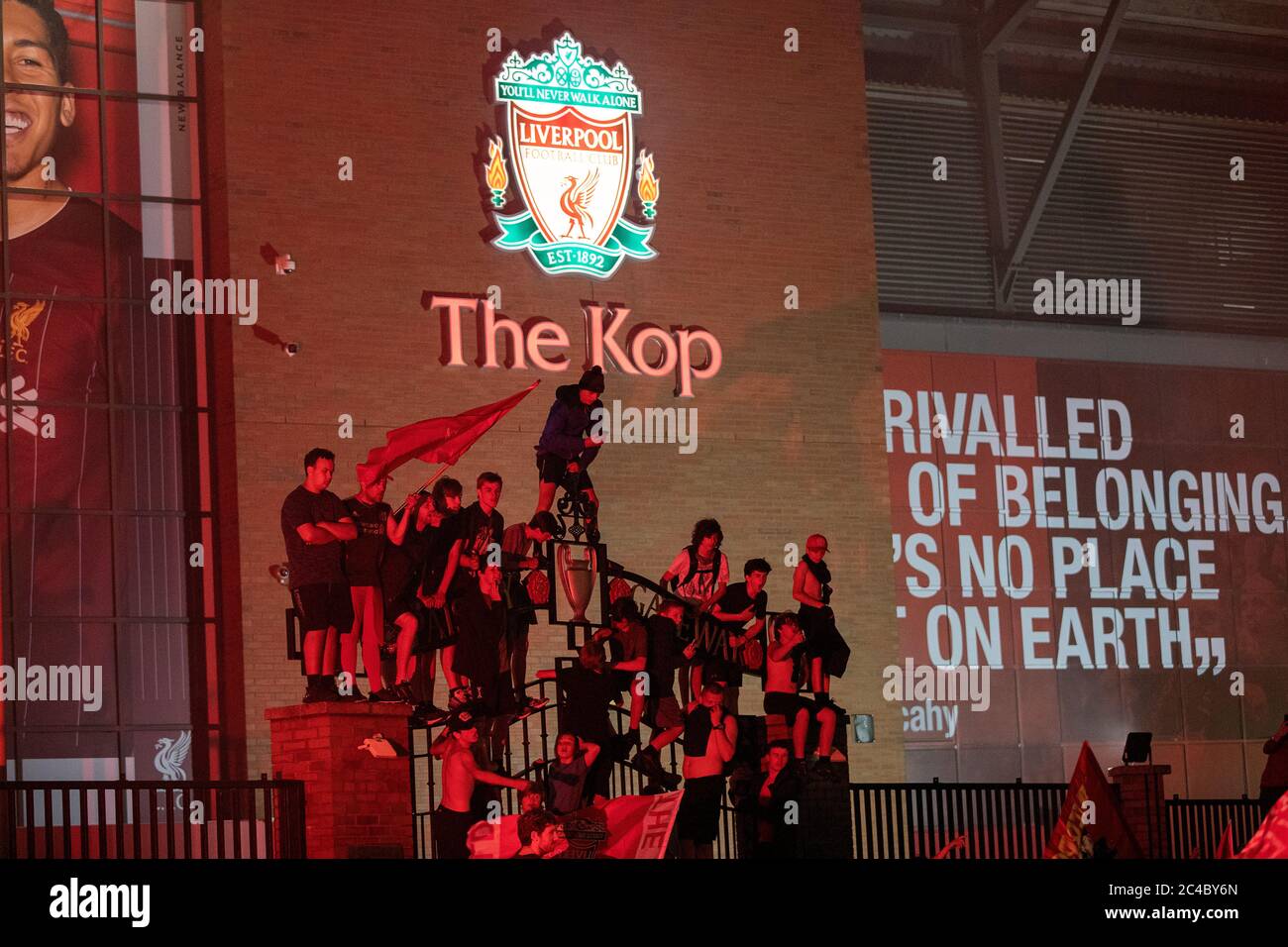Liverpool fans celebrate outside Anfield, Liverpool Stock Photo - Alamy