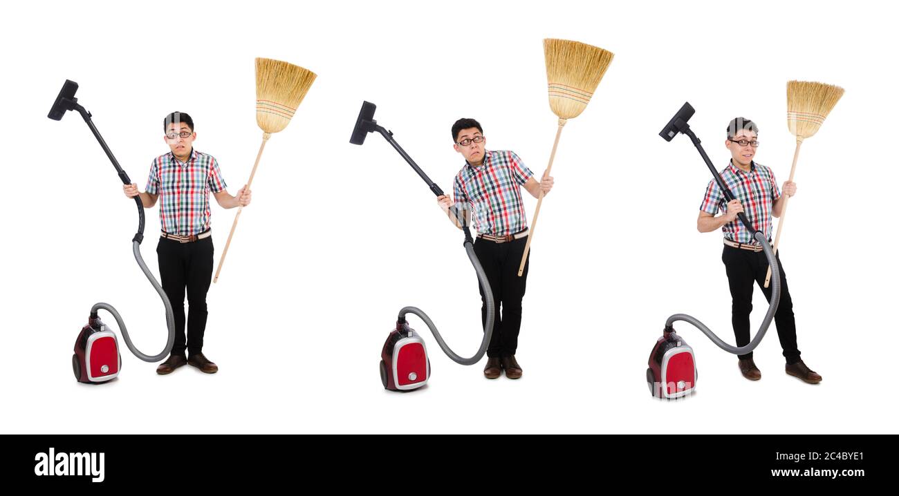 The man with vacuum cleaner and broom on white Stock Photo - Alamy