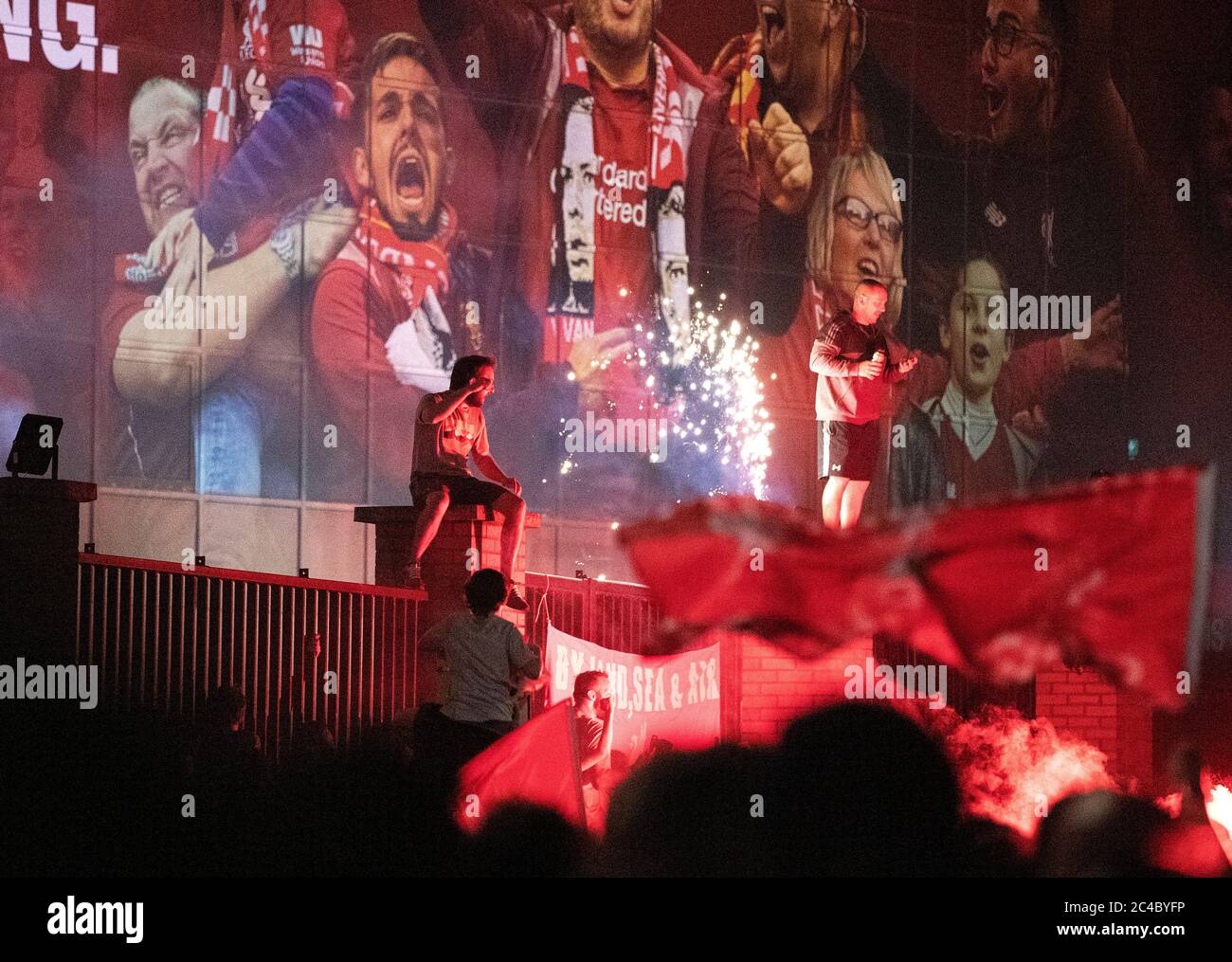 Liverpool fans celebrate outside Anfield, Liverpool Stock Photo - Alamy