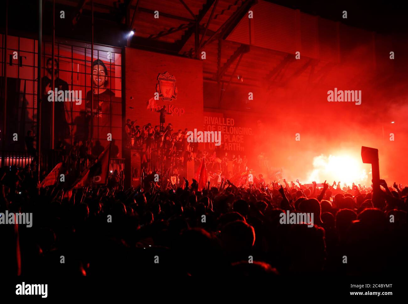 Liverpool fans let off flares outside Anfield, Liverpool Stock Photo ...
