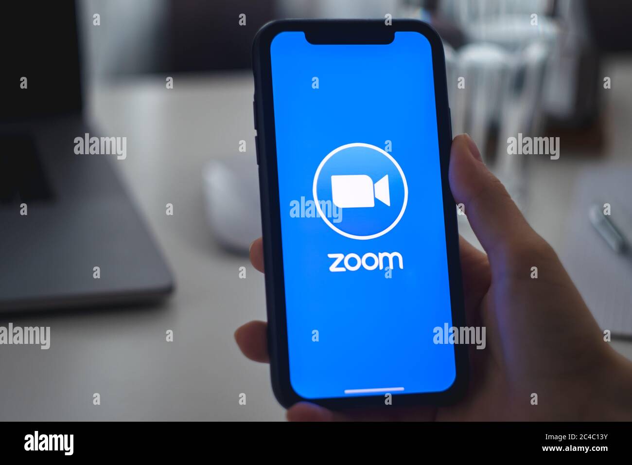 zoom video conference app logo on the smartphone screen Stock Photo - Alamy
