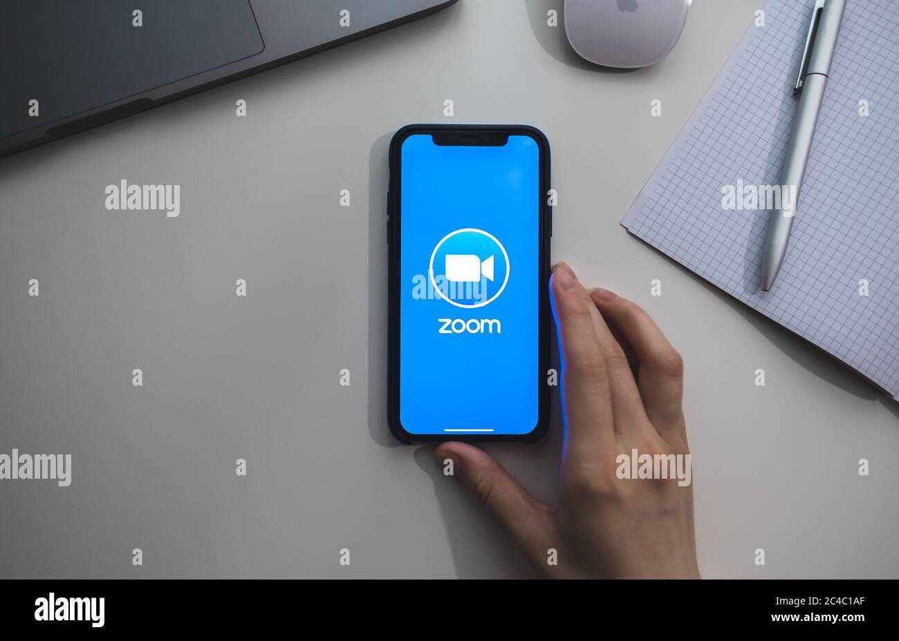 zoom video conference app logo on the smartphone screen Stock Photo - Alamy